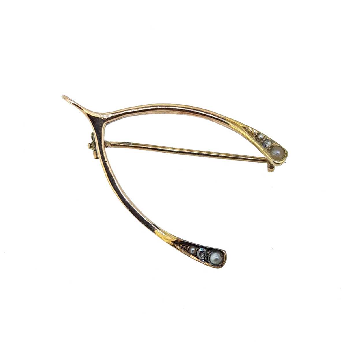 Lot 28 - A Victorian pearl and diamond wishbone brooch,