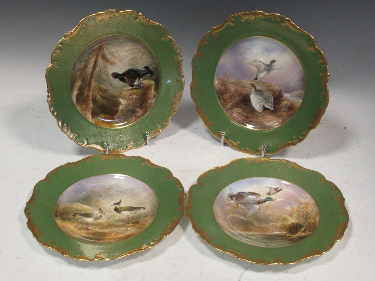 Lot 60 - A set of four Cauldon cabinet plates, painted