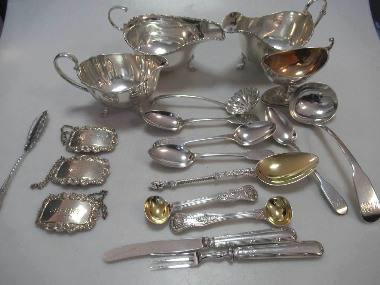 Lot 231 - A collection of silver flatware, mainly