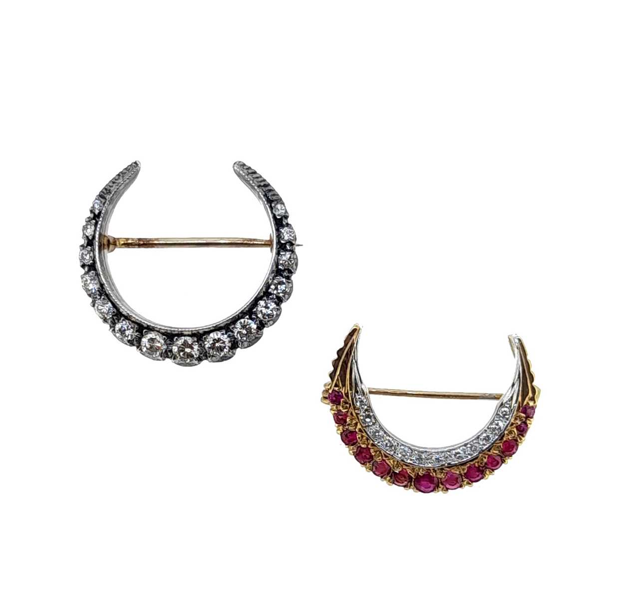Lot 36 - Two gem set crescent brooches,