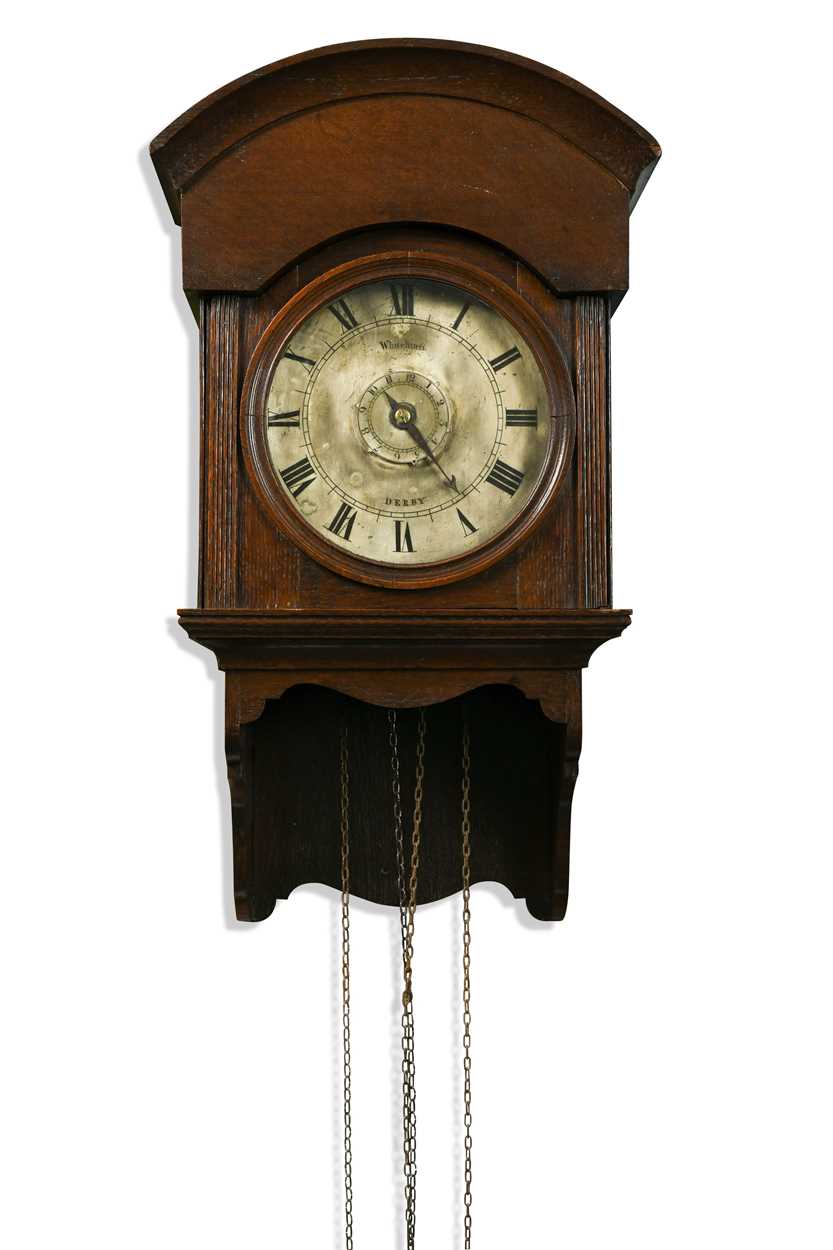 Lot 242 - An oak cased hooded pantry clock with alarm