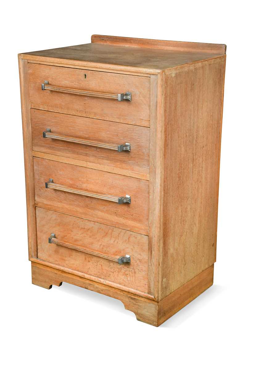 Lot 158 - An Art Deco limed oak chest of drawers,