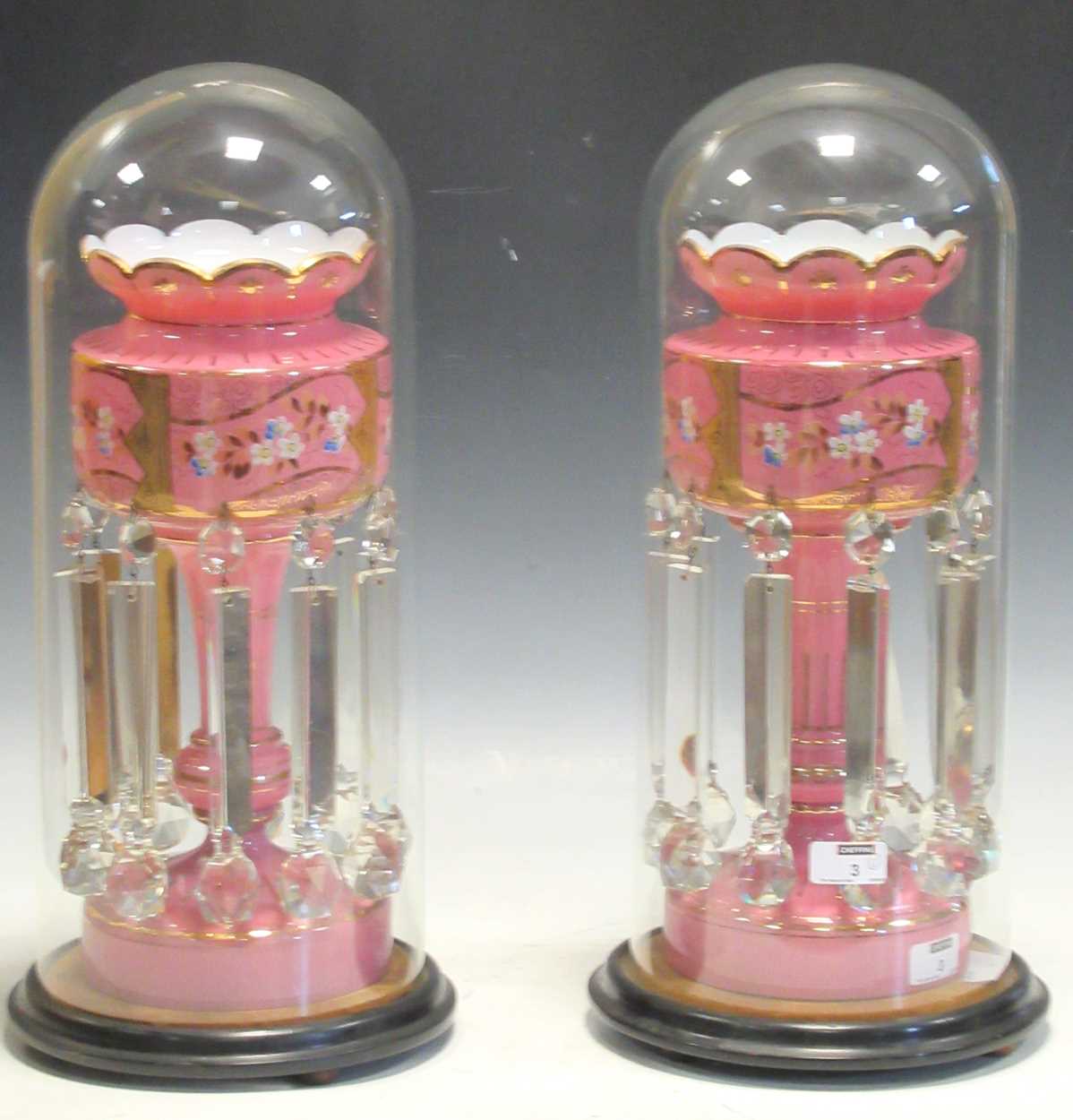 Lot 3 - A pair of pink glass table lustres with floral