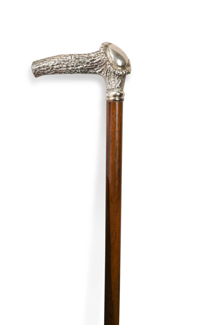 Lot 855 - A modern silver handled walking cane,