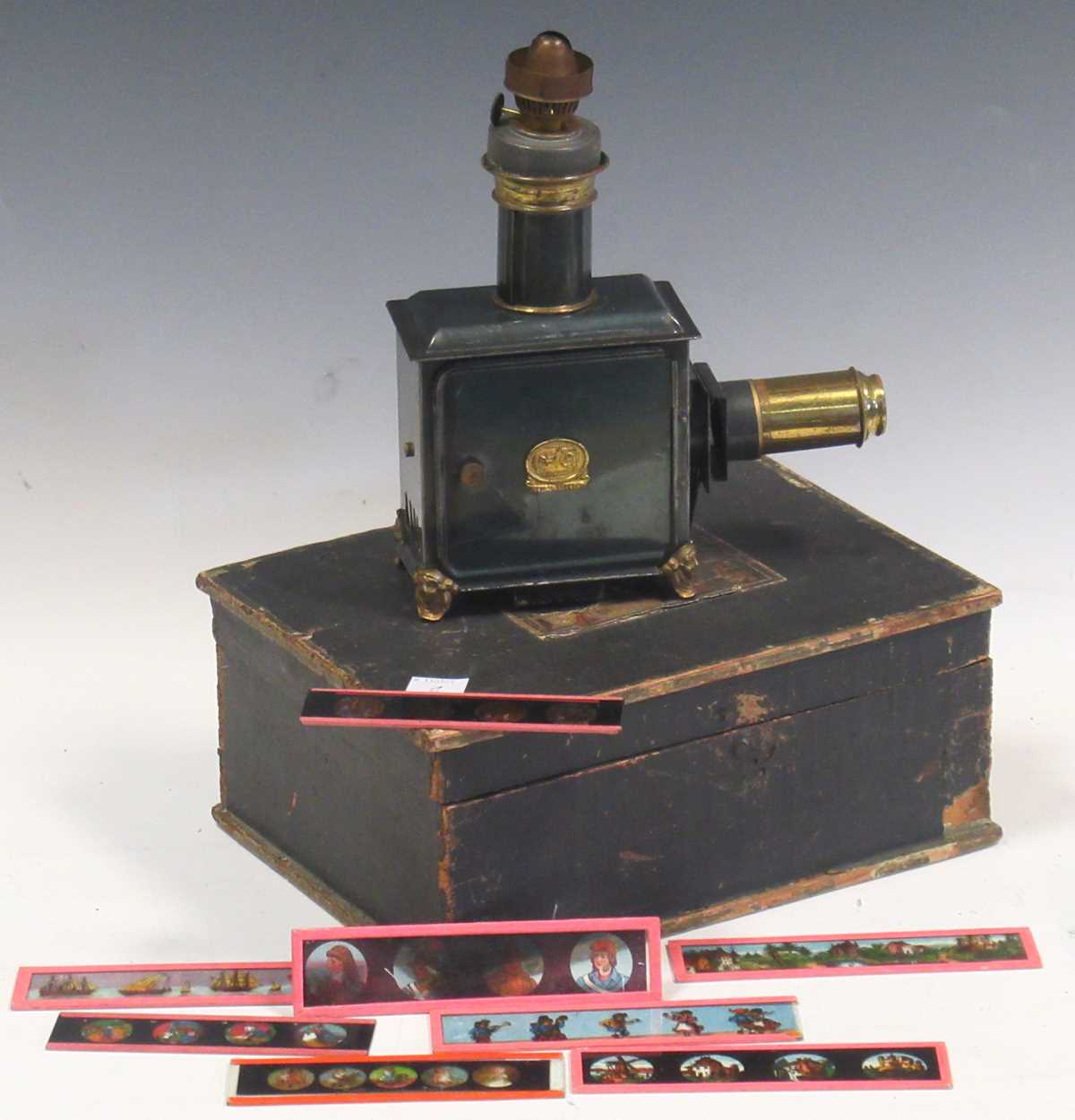 Lot 51 - A German spirits magic lantern with slides in