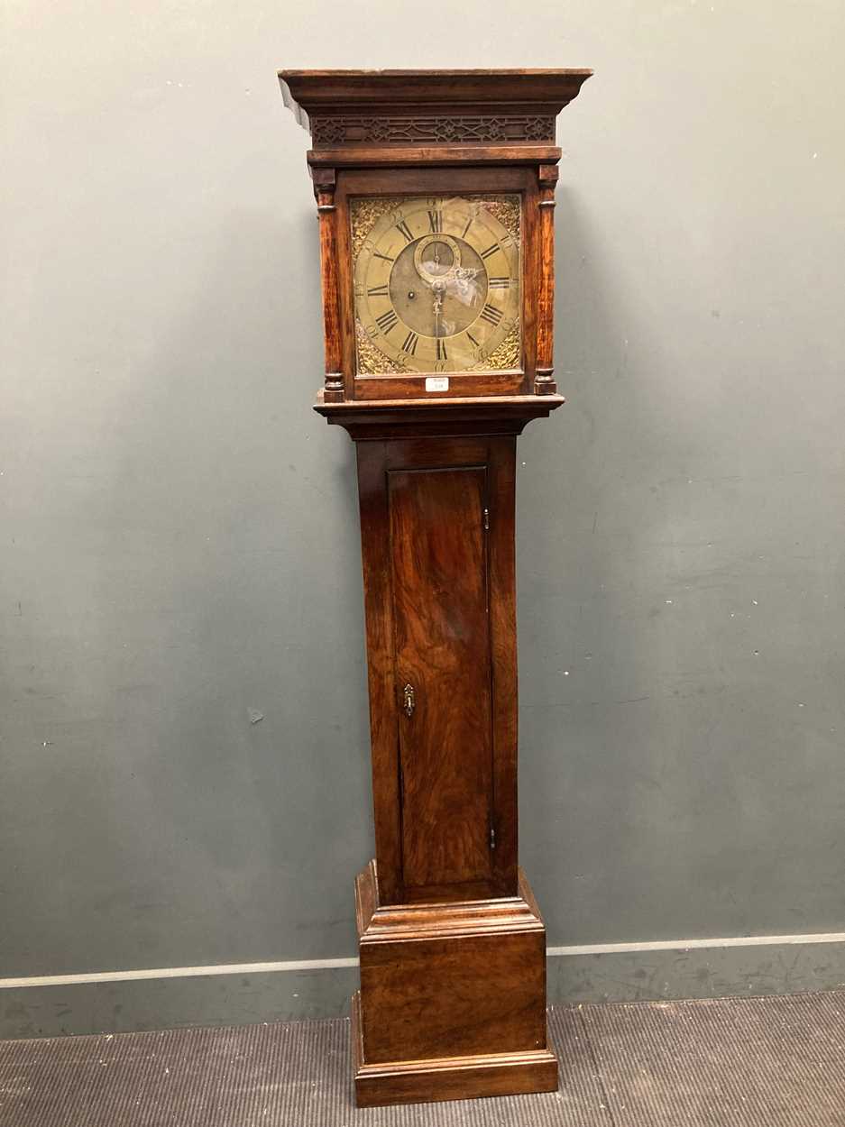 Lot 334 - A brass dial walnut longcase clock (18th