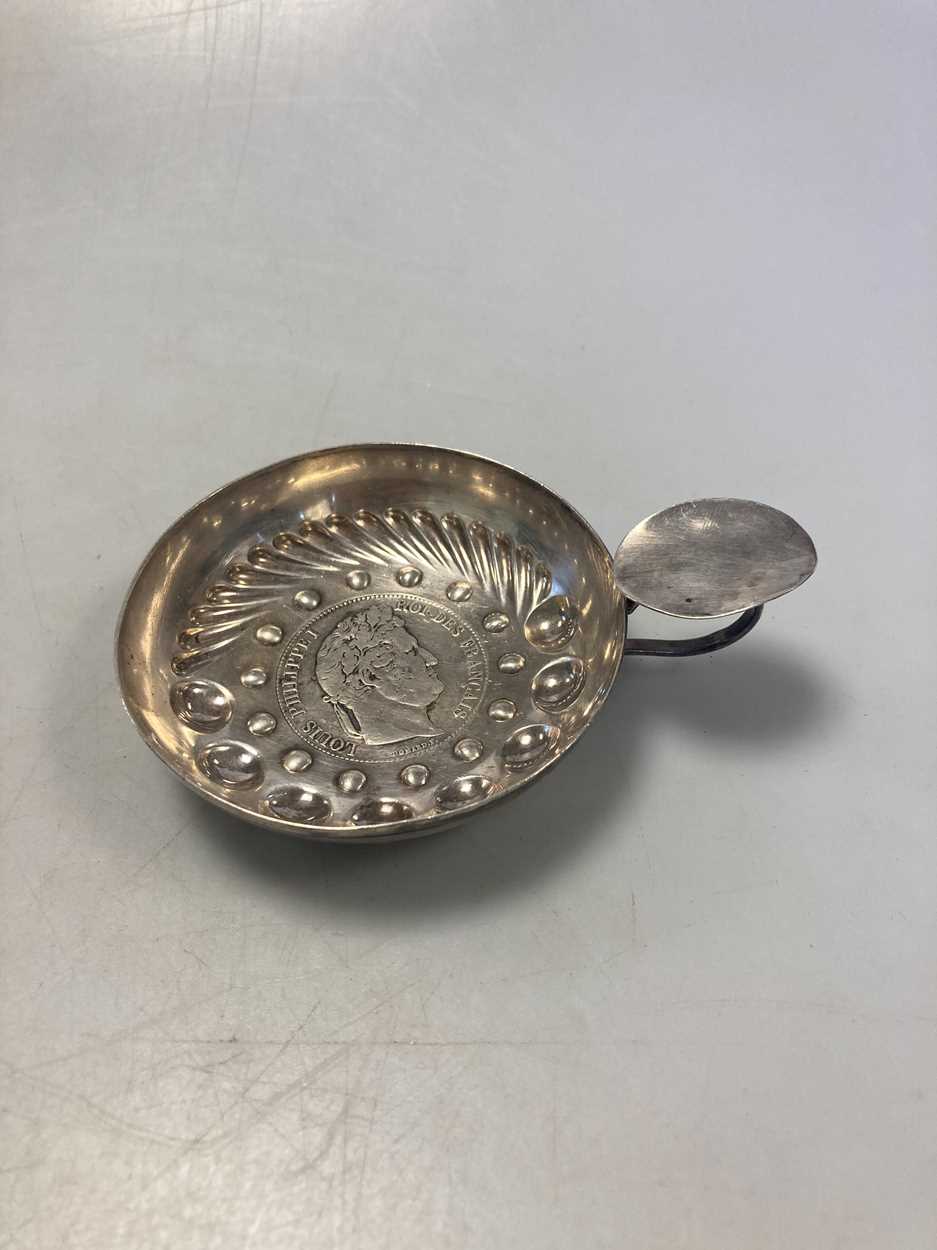 Lot 185 - A French metalwares silver tastevin by