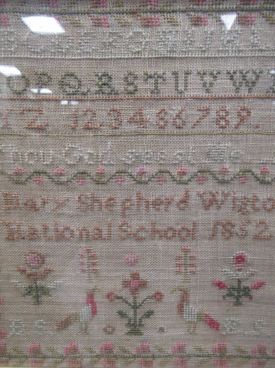 Lot 238 - A 19th century sampler, embroided with the