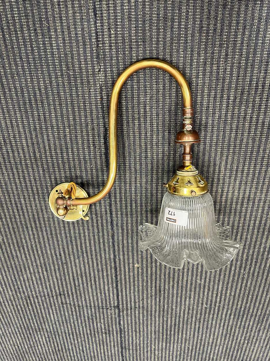 Lot 172 - A Victorian brass and glass gas wall light,