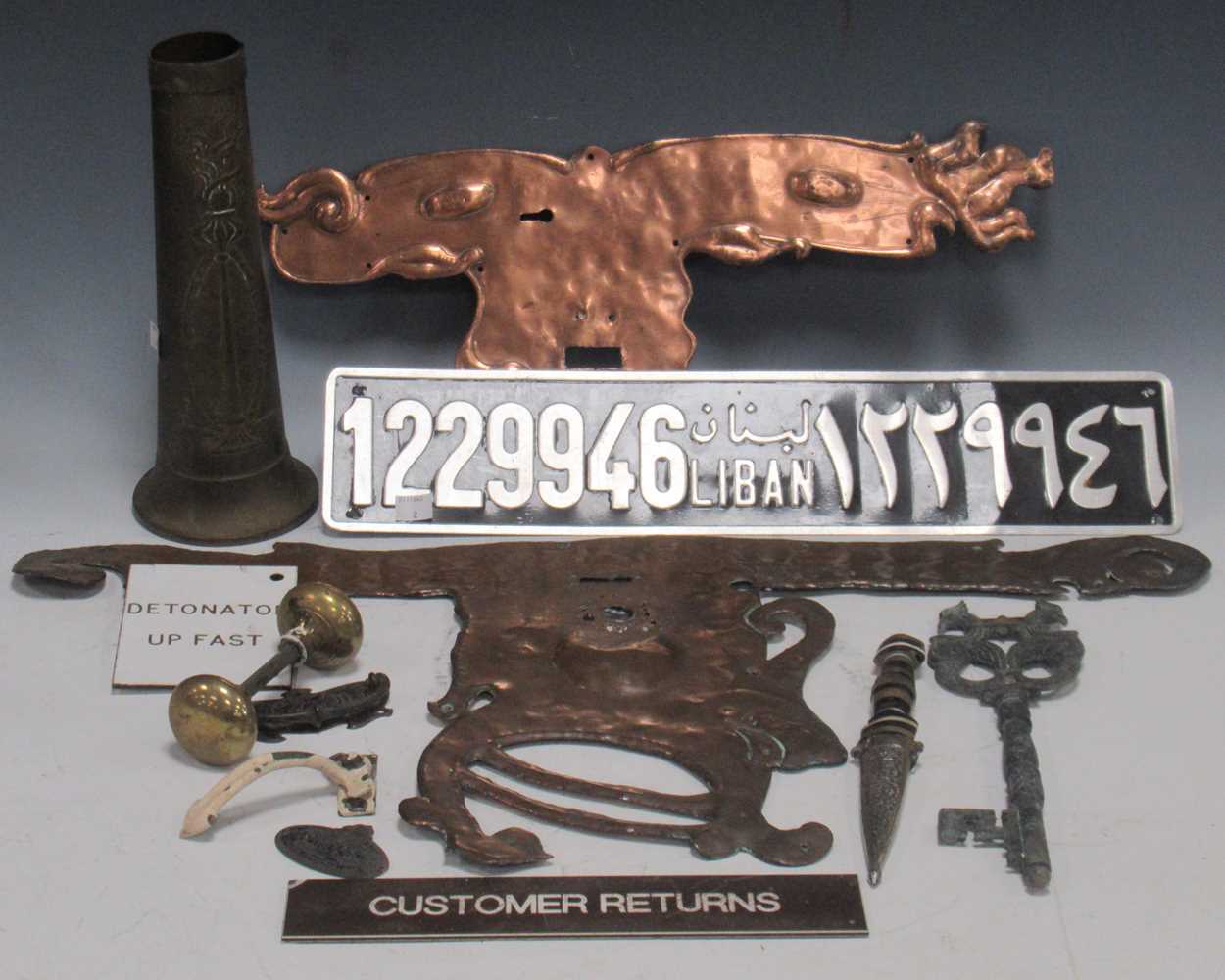 Lot 34 - Metal items to include an elaborate beaten