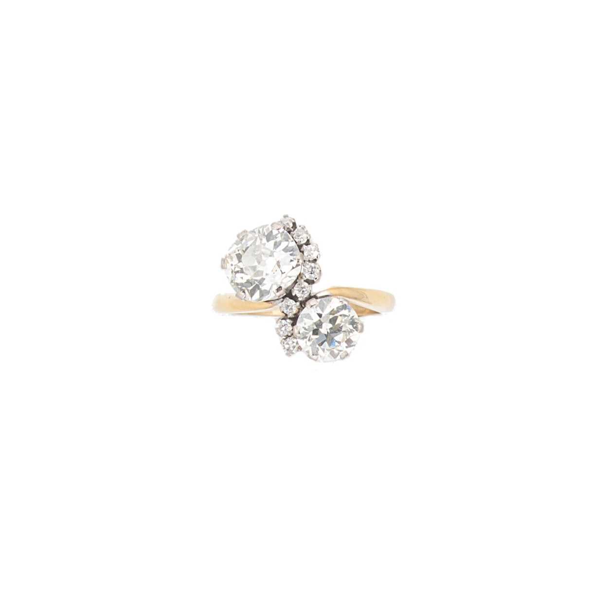 Lot 179 - A diamond set crossover style ring,