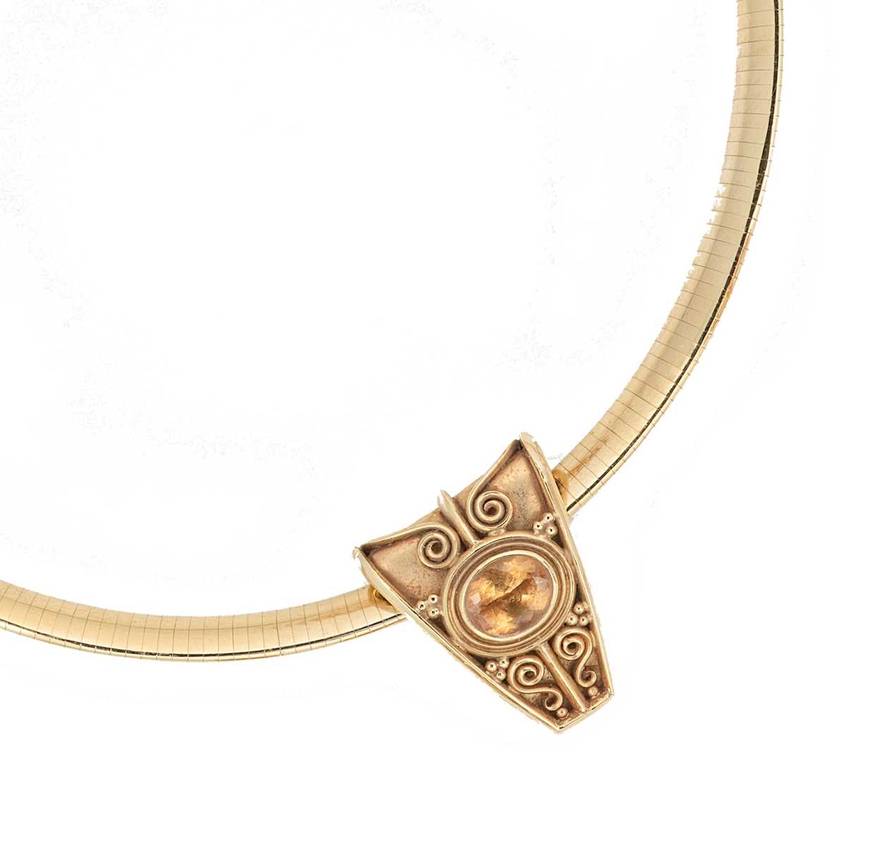 Lot 141 - A topaz pendant on an omega style chain,