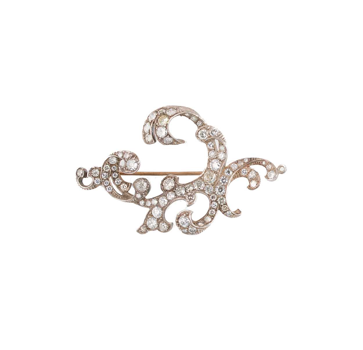 Lot 182 - A diamond set scroll brooch,
