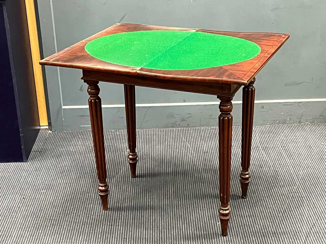 Lot 385 - A Victorian mahogany games table with