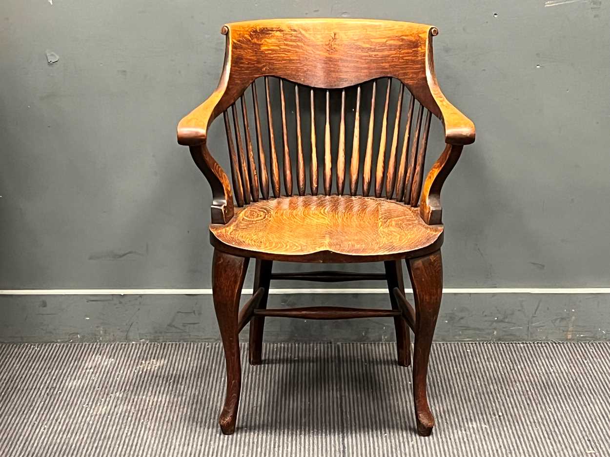Lot 380 - An Edwardian spindle back desk chair with