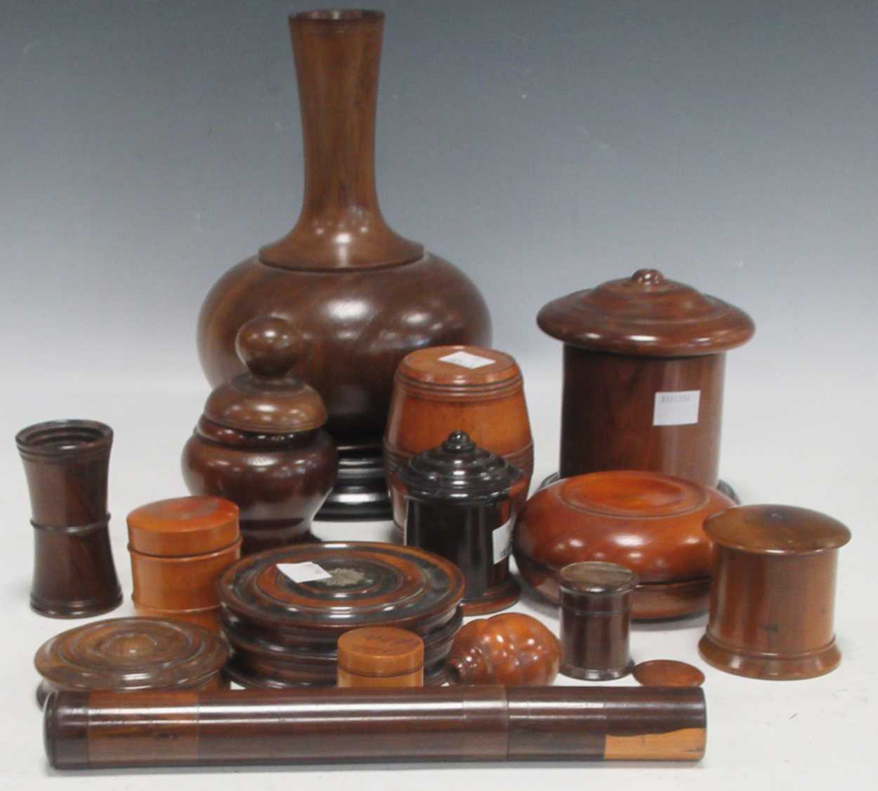 Lot 30 - A collection of small treen boxes and a