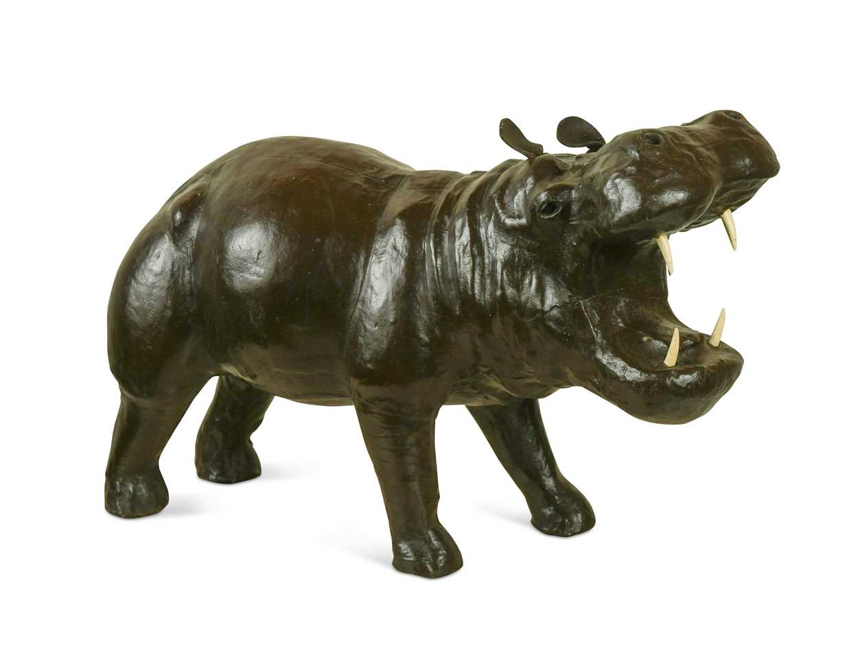 Lot 172 - A leather clad model of a hippo,