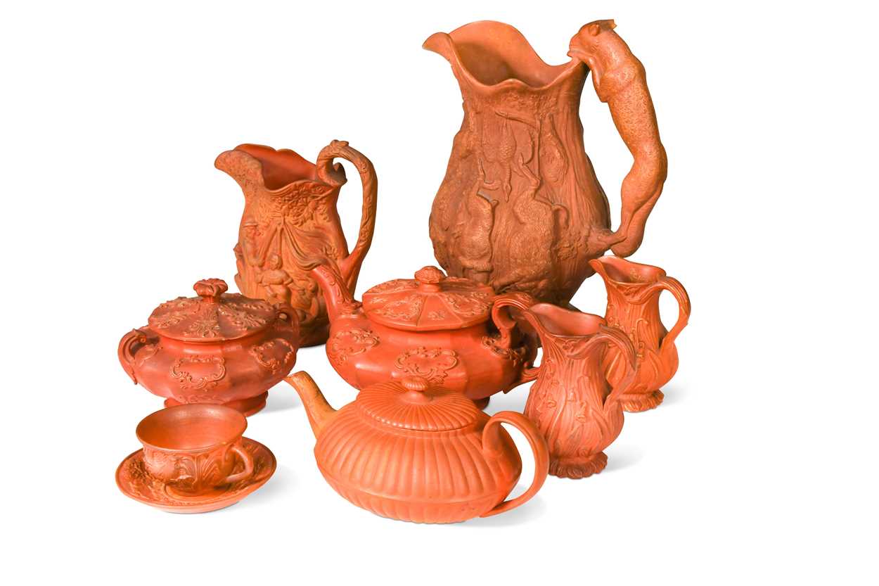 Lot 528 - A group of eight redware items,