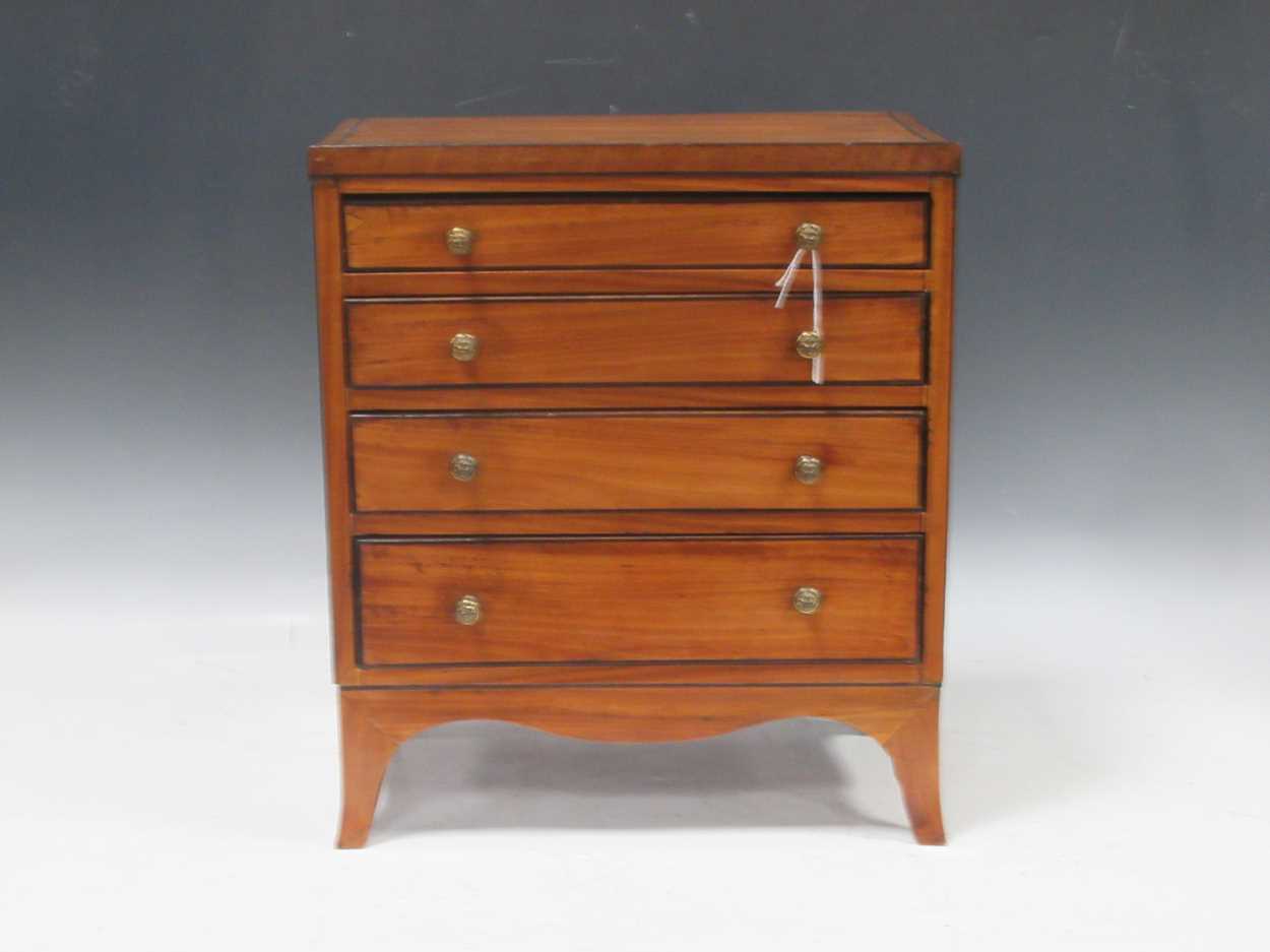 Lot 222 - A satinwood apprentice chest of drawers,