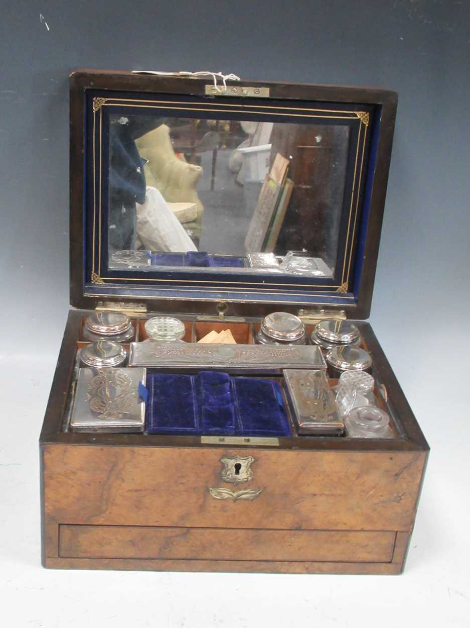 Lot 122 - A Victorian walnut dressing table box with