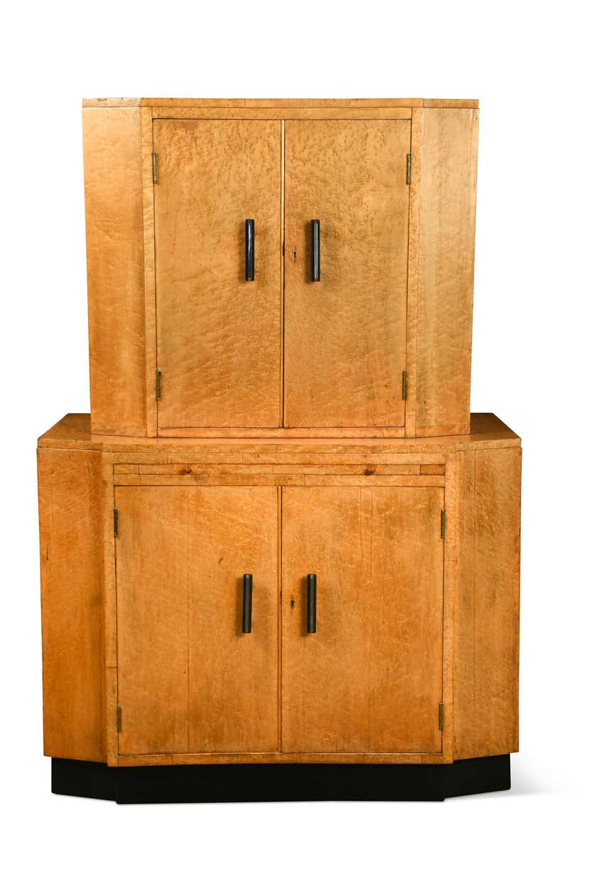Lot 323 - An Art Deco birds eye maple cocktail cabinet,