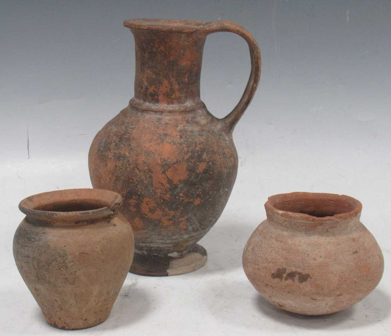Lot 13 - Set of three interesting terracotta vessels,