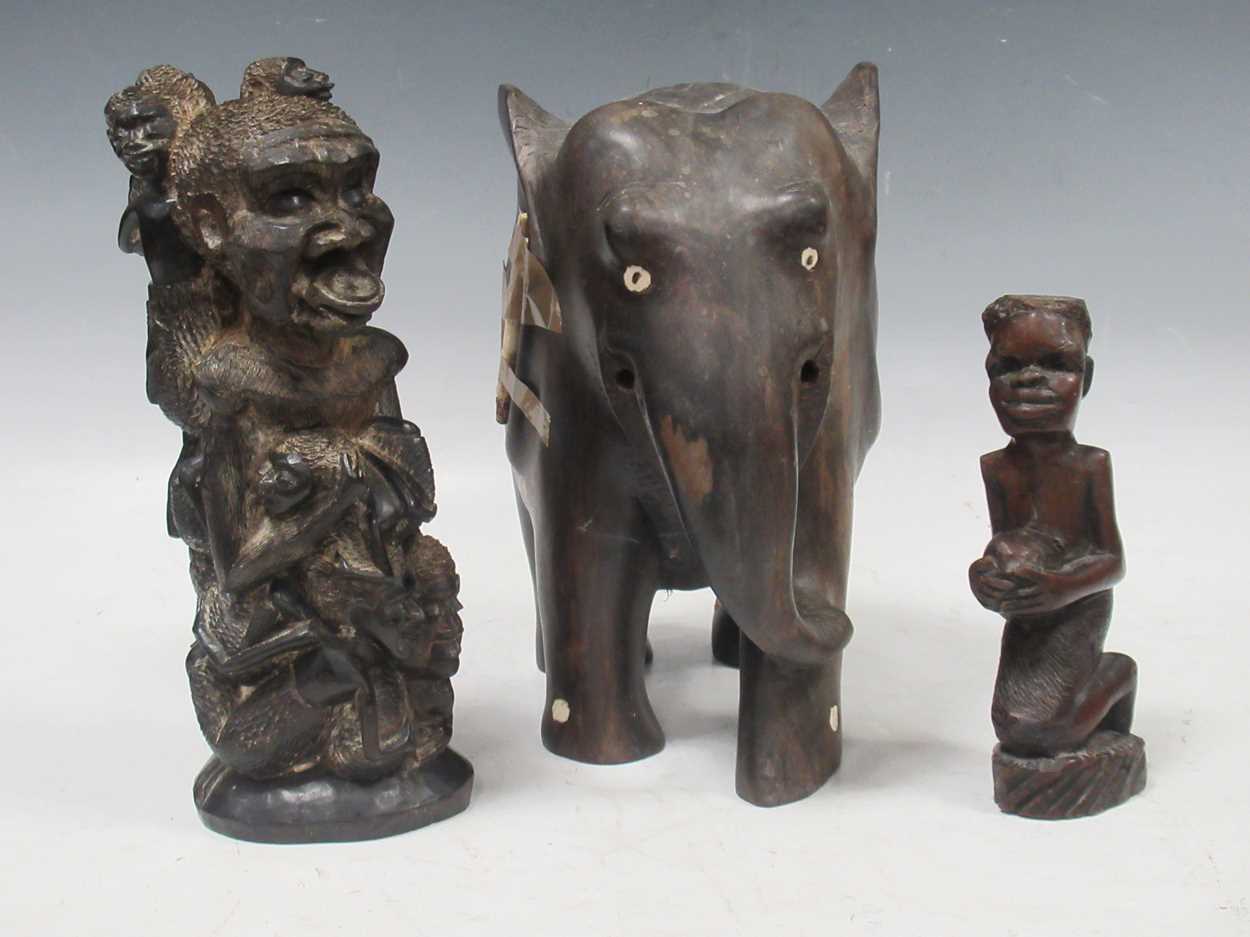 Lot 125 - African tribal carvings, elephant with bone