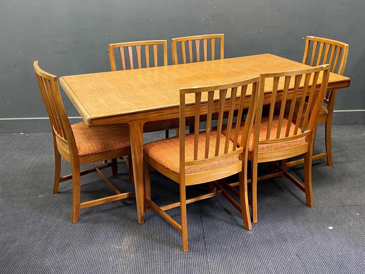 Lot 372 - A Macintosh teak extending dining table and