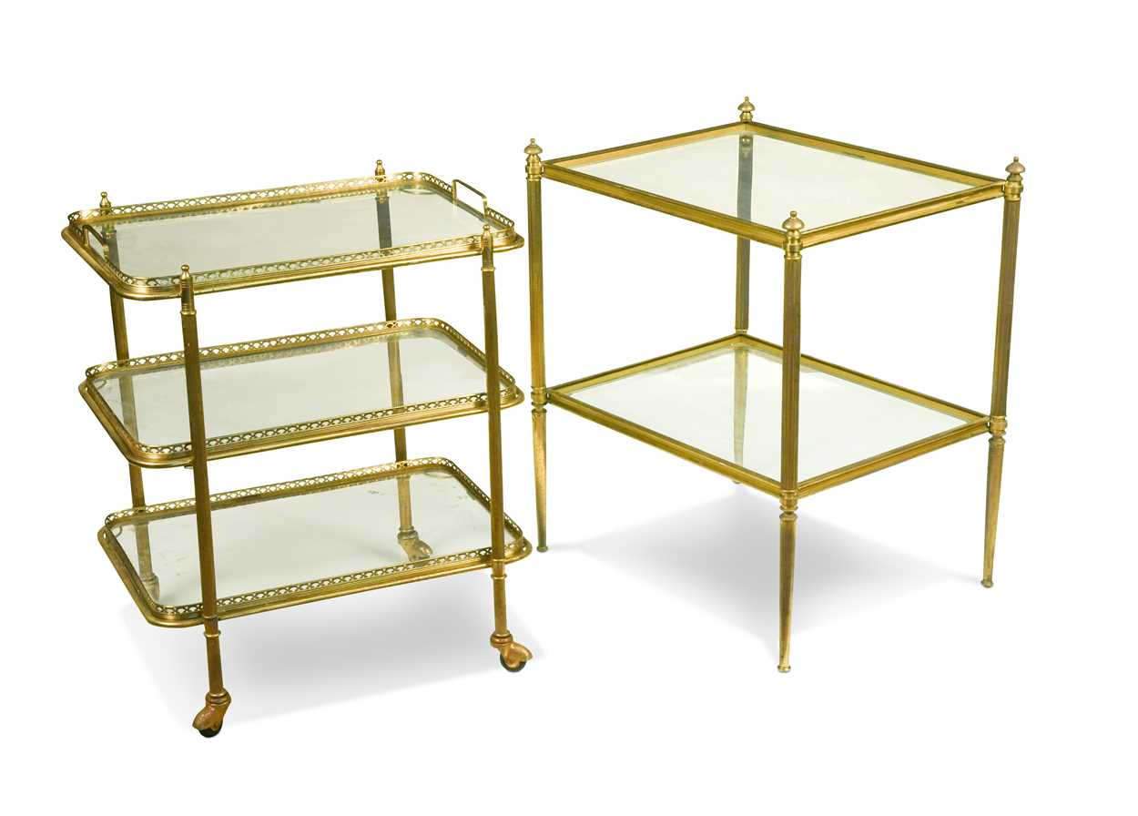 Lot 460 - A brass and glass two tier side table,
