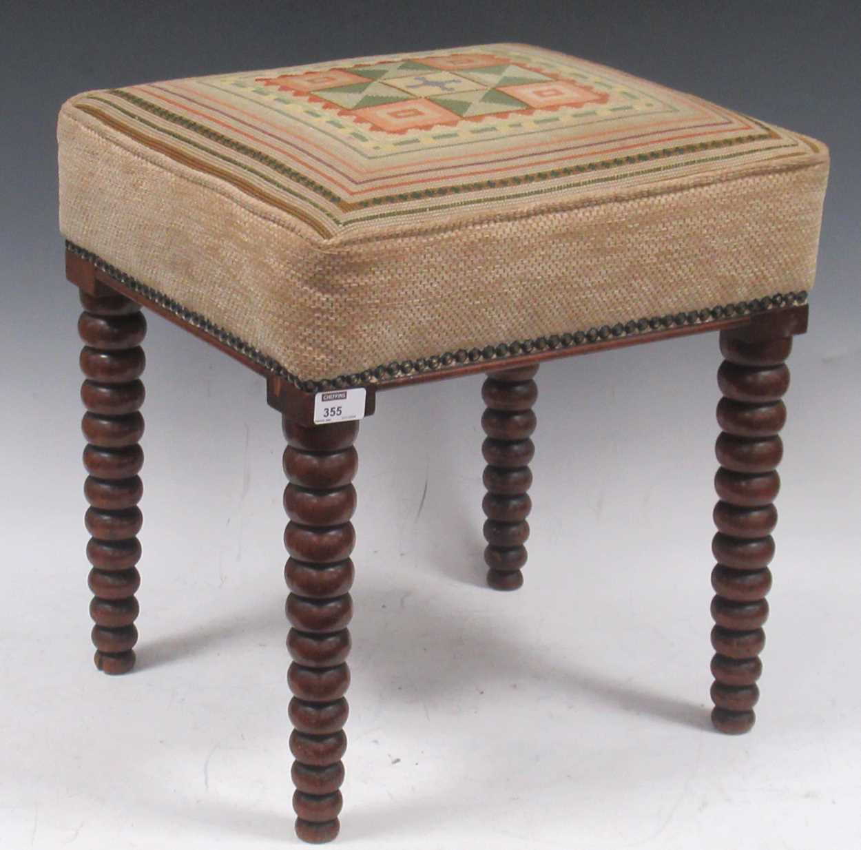 Lot 355 - A 20th century bobbin turned stool, the