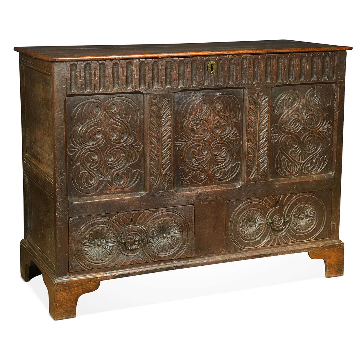 Lot 271 - An carved oak mule chest, incorporating 17th