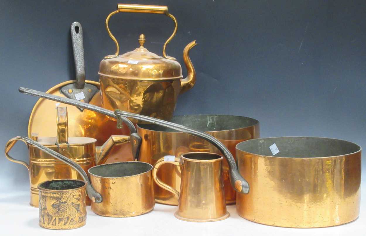 Lot 241 - A collection of copperwares: graduated
