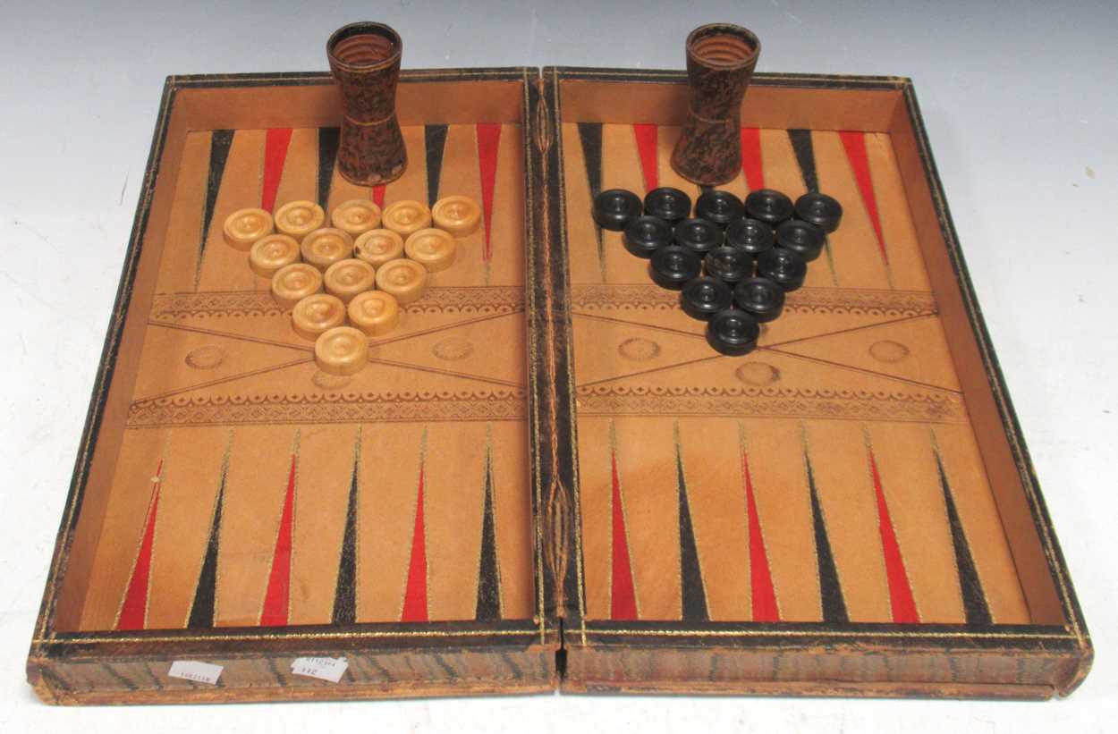 Lot 174 - Backgammon set in leather bound book form,