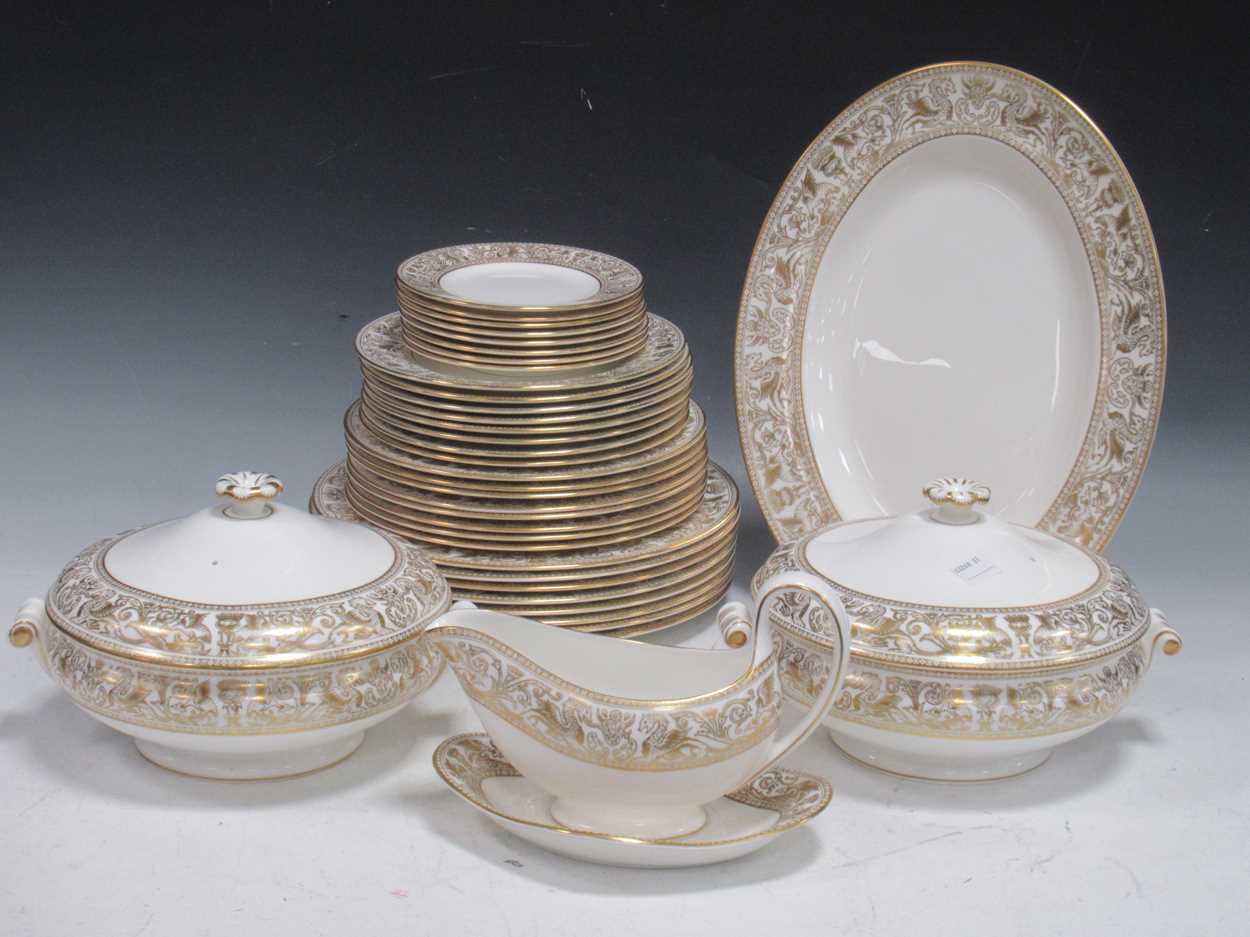 Lot 121 - Wedgwood 'Gold Florentine' pattern dinner