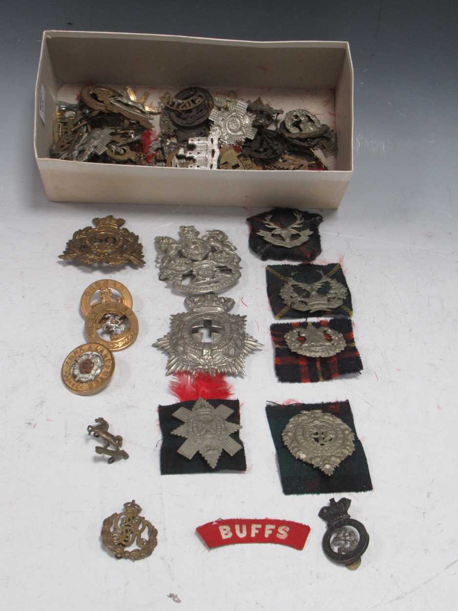 Lot 185 - A quantity of Military badges including a