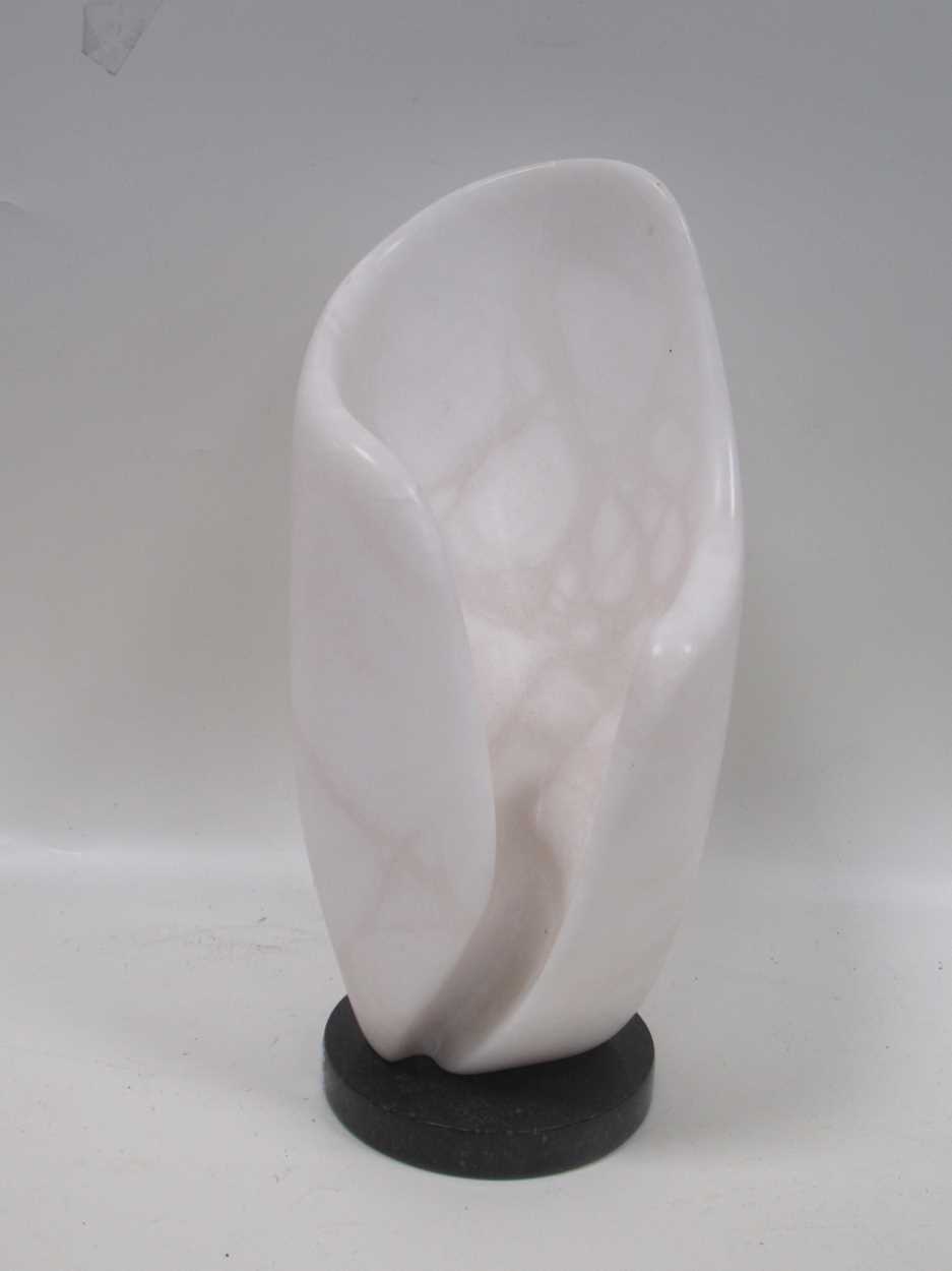 Lot 208 - A modern shell shaped alabaster sculpture,