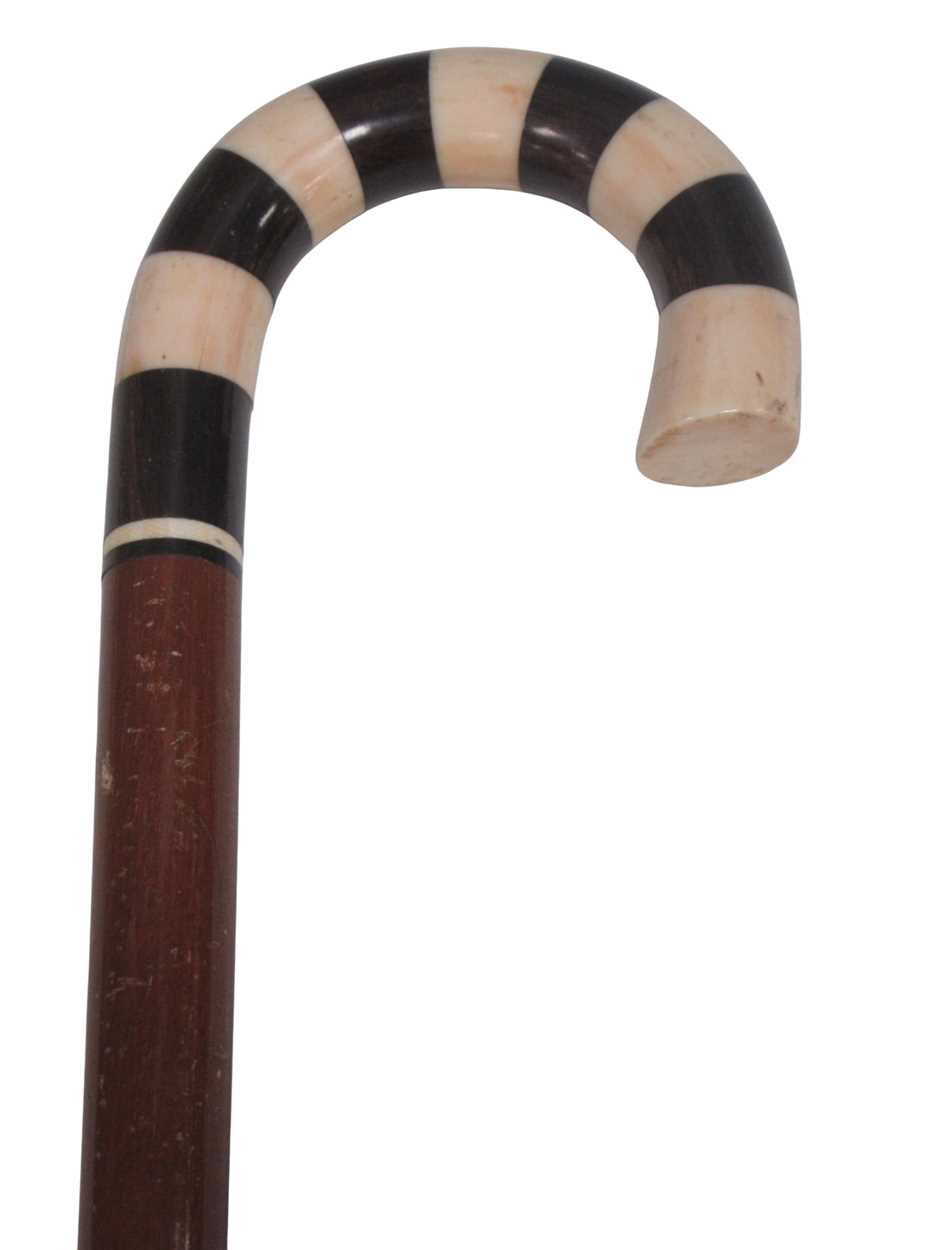 Lot 158 - An ivory and rosewood handled walking cane