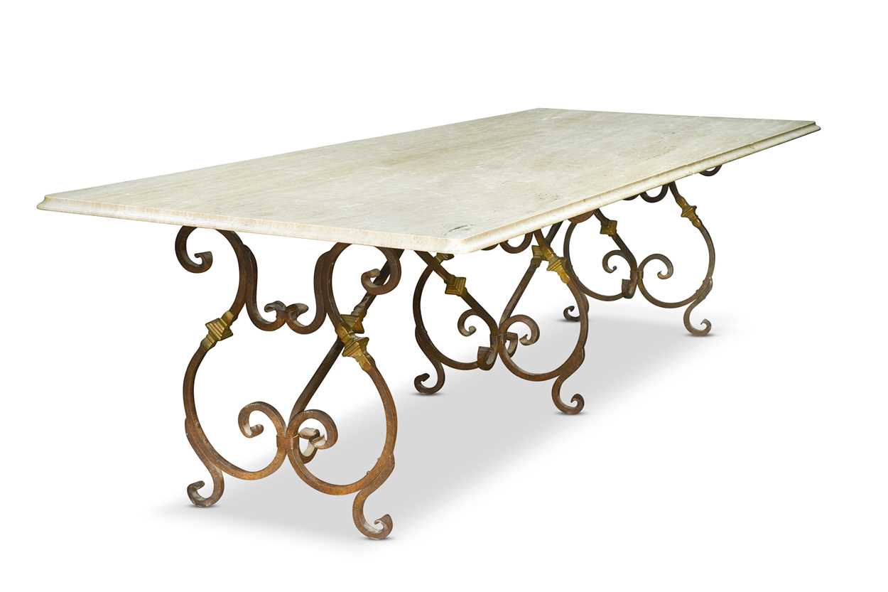 Lot 471 - A travertine and wrought iron dining table,