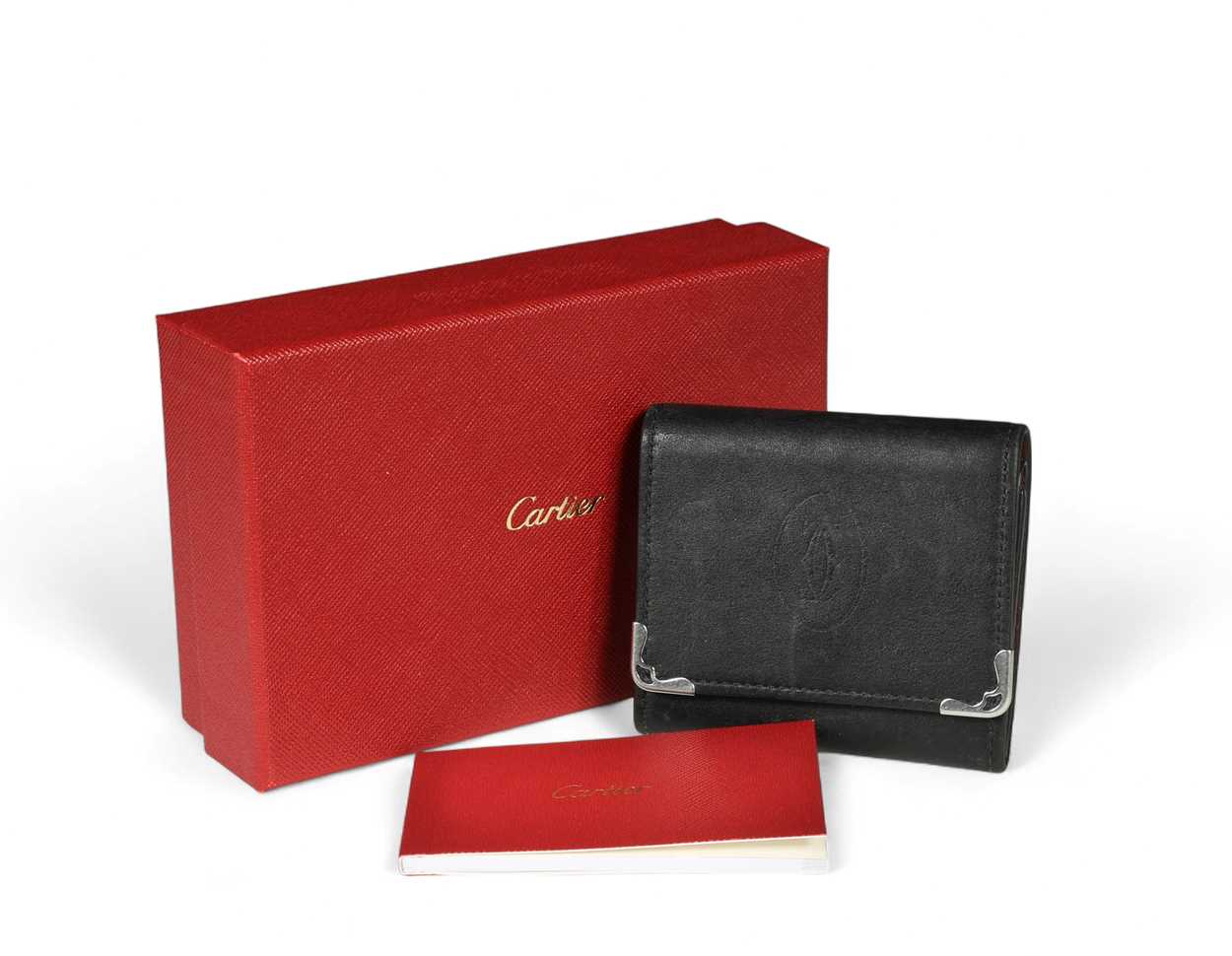 Lot 113 - Cartier - A small wallet,
