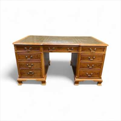 Lot 600 - A modern yew wood partners desk with green