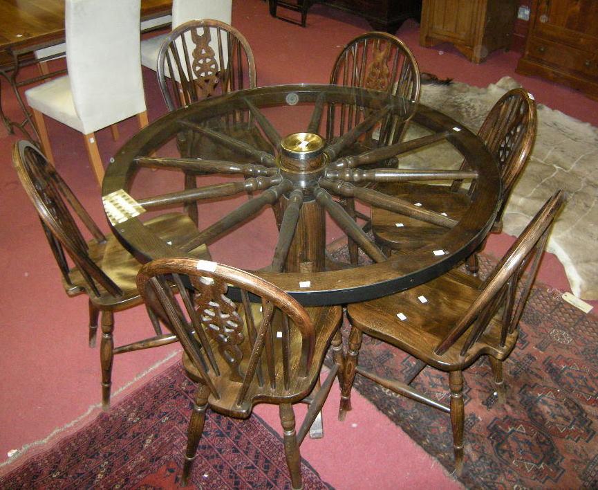 Lot 173 A Set Of Six Wheelback Dining Chairs And A