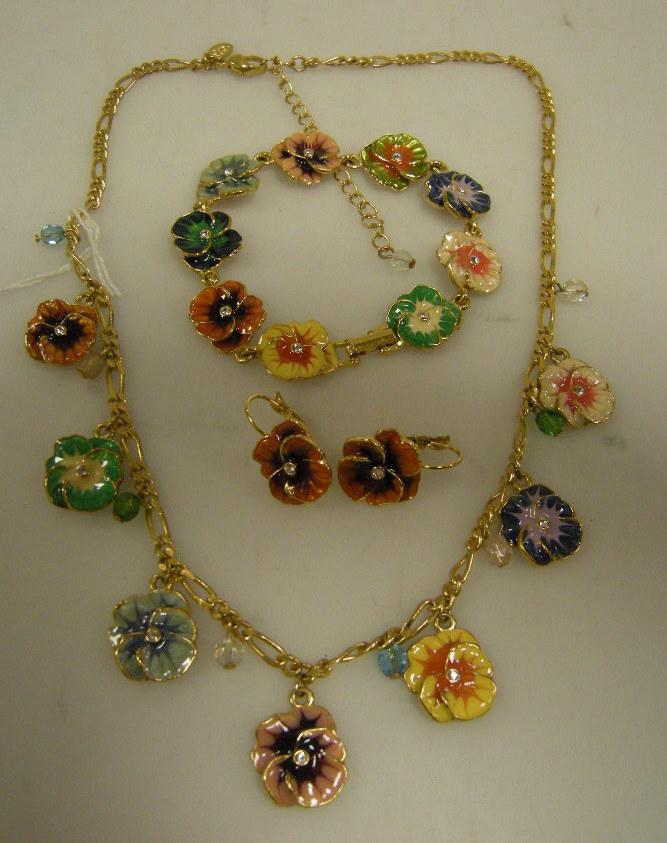 Lot 531 - Joan Rivers - enamelled costume pansy