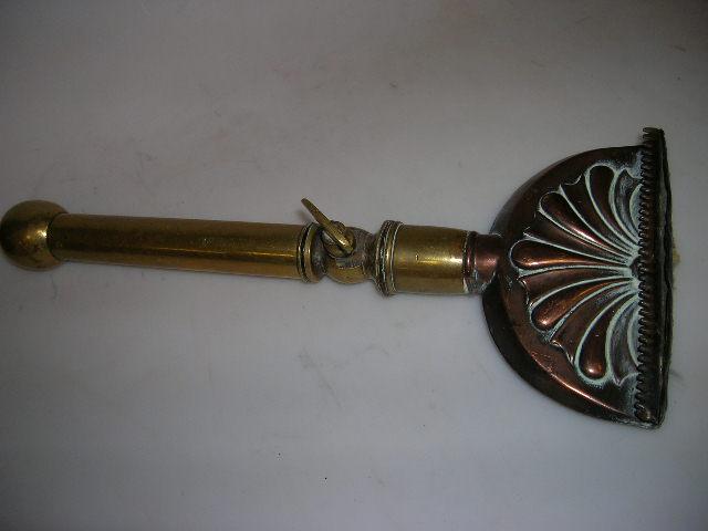Lot 133 - A Victorian copper and brass singing iron