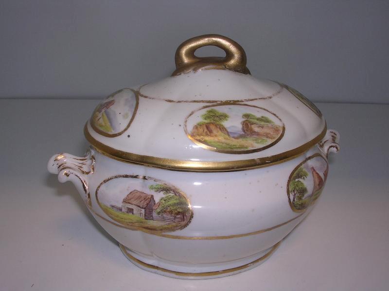 Lot 31 - A puce mark Derby sauce tureen and cover