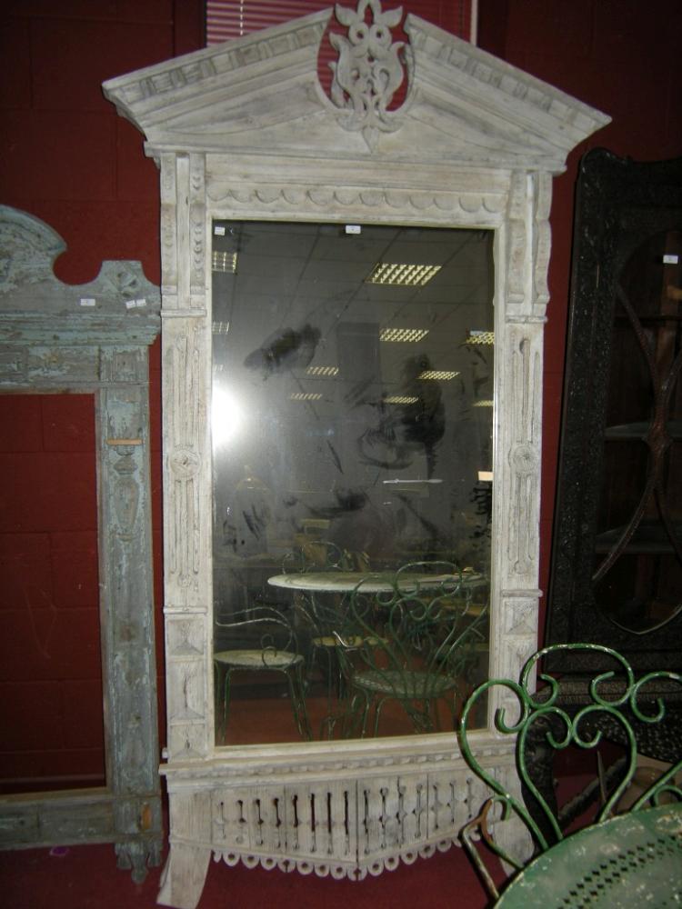 Lot 16 - A pair of Continental painted framed mirrors