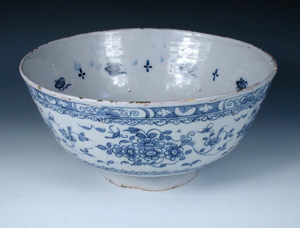 Lot 1 - A mid 19th century Delft ware blue and white