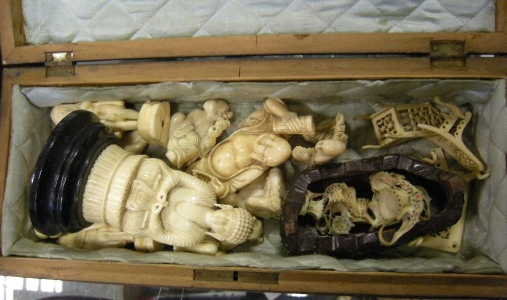 Lot 986 - A small box of ivory netsuke