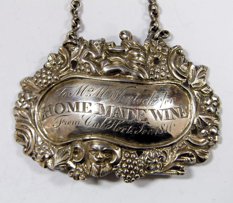 Lot 254 - A Regency Scottish silver wine label,
