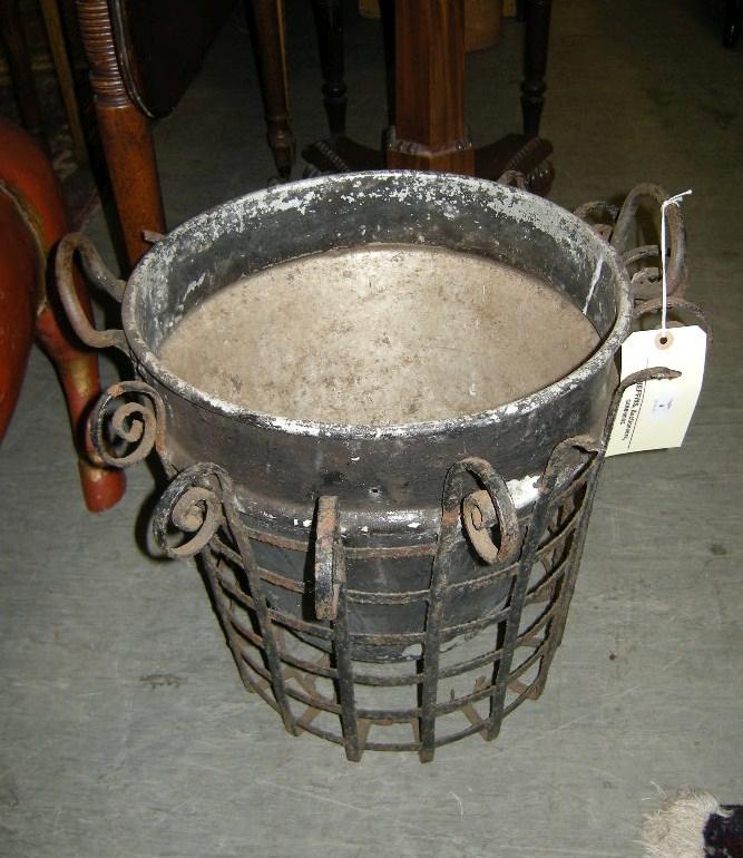 Lot 4 - A wrought iron frame planter