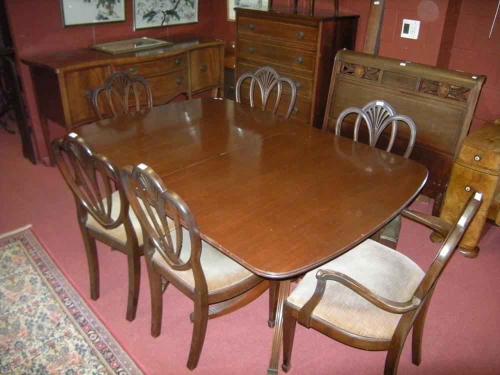Lot 20 - A reproduction dining table plus six chairs